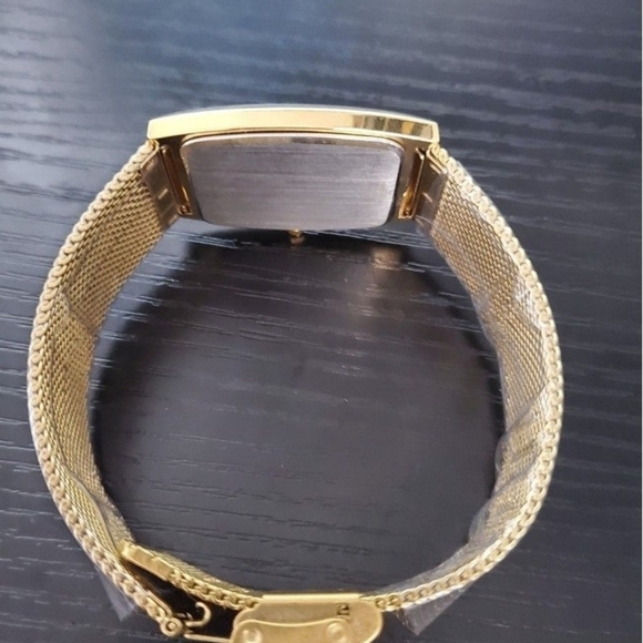 Seiko | Accessories | New Old Stock Rare Vintage Seiko Slim Tank Quartz Mens Gold Watch | Poshmark